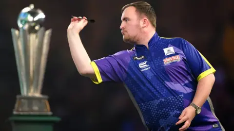 In pictures: Luke Littler,16, defeated by Luke Humphries in PDC World ...