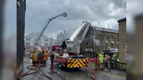 Keighley takeaway fire: Major response scaled down