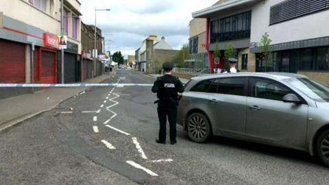 Woman 'critical' after drill attack in Strabane - BBC News