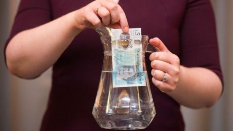 Why countries print money outside their borders - BBC News