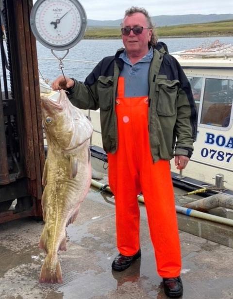 Grandfather lands 'biggest ever cod' in Scottish waters - BBC News