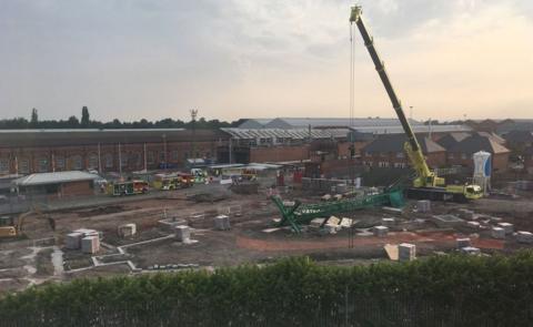 Two men killed after crane collapses in Crewe - BBC News