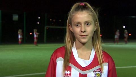Women's football: Girl 'a champion' against sexism - BBC News