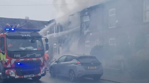 Bury explosion: Evacuation after woman hurt in blast at house - BBC News
