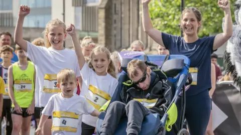 Rob Burrow's children join him at Father's Day run