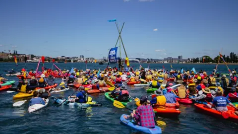 Climate protest: More than 100 arrested at world's largest coal port