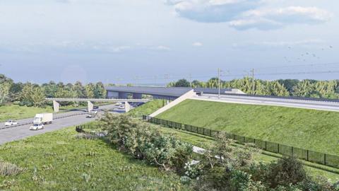M42 reopens after huge HS2 bridge installed - BBC News