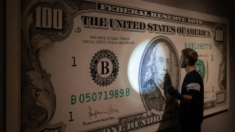 Defaced money show in Cambridge addresses 250 years of anger