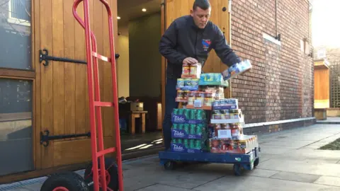 The Muslim families donating to food banks for Christmas