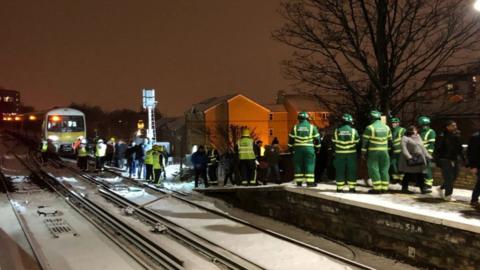Passengers jump on to Lewisham train tracks after delays - BBC News