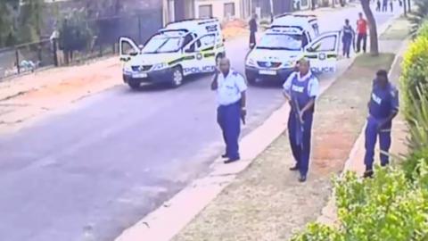 South African police filmed 'shooting suspect dead' - BBC News