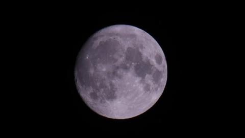 Super blue moon dazzles sky across Northern Ireland - BBC News