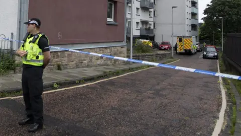 Police investigate 'unexplained' death at Edinburgh flats