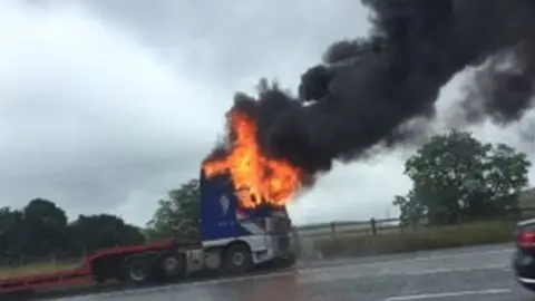 Delays after lorry catches fire on A74 (M) at Crawford