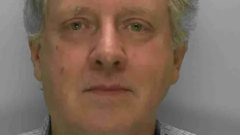Ex-Brighton GP handed life sentence over serial sex offences