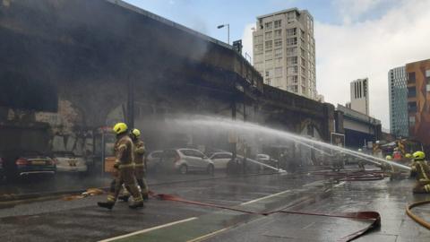 Elephant and Castle fire: Six hurt in huge blaze at railway arches ...