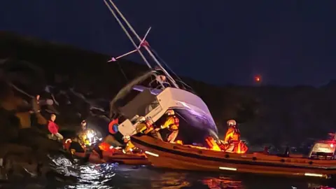 Eight rescued after yacht hits rocks near St Helier harbour