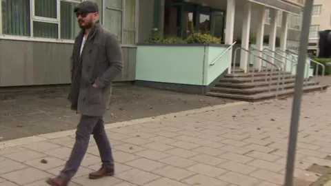 Former Olympic swimmer denies raping two girls