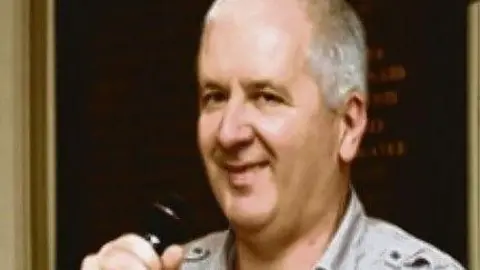 Hugo Duncan: BBC presenter receives MBE from Prince William