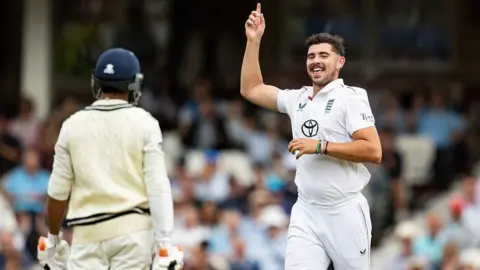 England bowler Josh Tongue celebrates the wicket of India's Ravindra Jadeja at The Oval