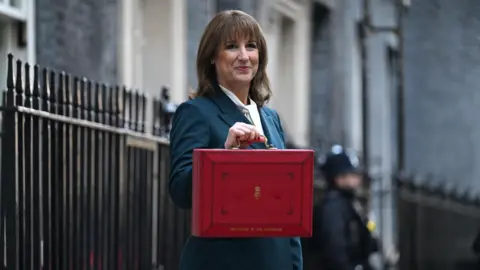 Newspaper headlines: 'Rachel Reeves' Budget Ledger' and 'Jury trials ...