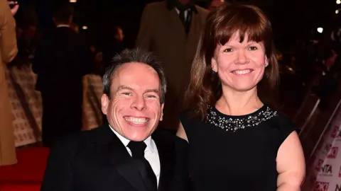 Warwick Davis' children fundraise in mum's memory