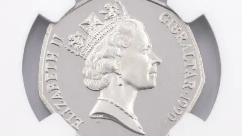 Experts says 'there could be more' as rare 50p coin sells for £4,500