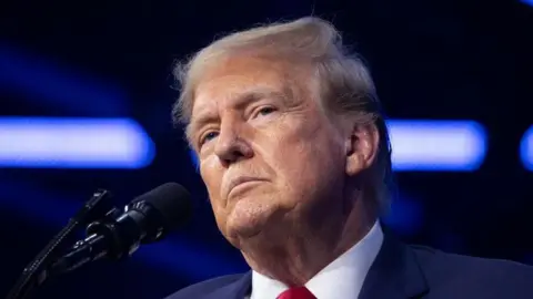 New York judge partially lifts Trump gag order in hush-money case