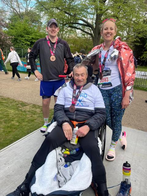 Guernsey family in London Marathon wheelchair-push for myositis - BBC News