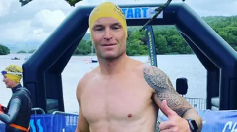 Dudley: Swimmers complete fundraising relay in memory of Iain Hughes