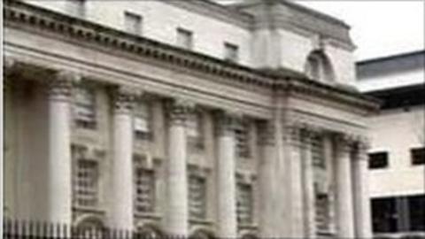Northern Ireland judge wins Sunday Times libel case - BBC News