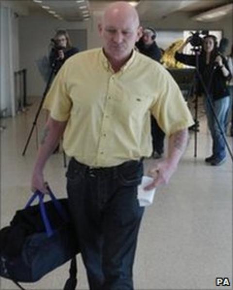 Garry Mann returns to UK to finish prison sentence - BBC News