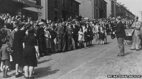 Wartime propaganda film on Nazi massacre is screened - BBC News