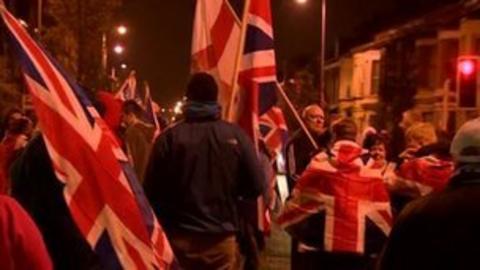 Trouble flares at flag protests in Belfast - BBC News