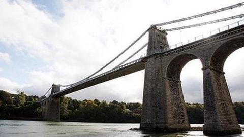 Menai Bridge's promenade centenary marked by parade - BBC News