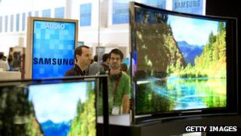 Samsung launches smartphone with curved display screen - BBC News