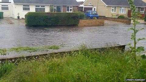 Heavy rain causes flash flooding in Norwich - BBC News