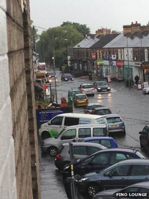 Rain brings flash flooding to Cardiff area - BBC News