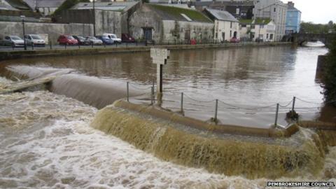 Flooding in Pembrokeshire and Ceredigion after downpours - BBC News