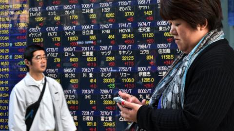 Japan comes out of recession but growth still disappoints - BBC News