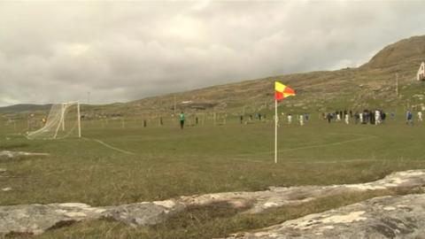Eriskay's bumpy football pitch wows Fifa - BBC News