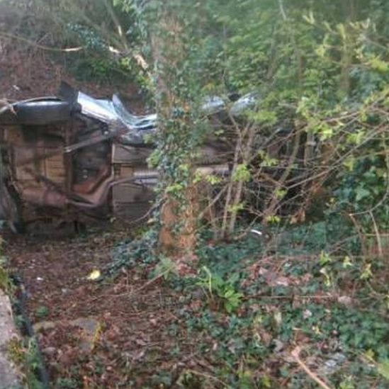 Three women escape serious injury after car ploughs off a bridge in ...