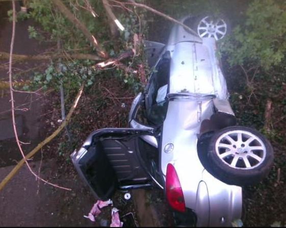 Three women escape serious injury after car ploughs off a bridge in ...