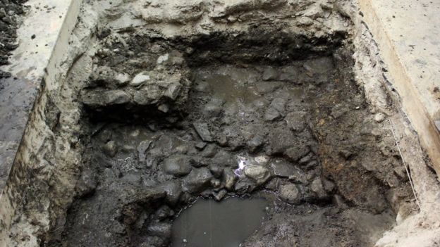 Roman remains found underneath former Gloucester Debenhams store - BBC News