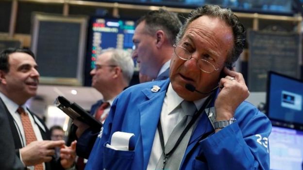 Global stock markets fall as Trump turmoil intensifies - BBC News