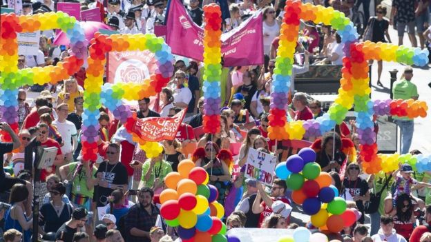 Pride Cymru parade in Cardiff draws 15,000 people - BBC News