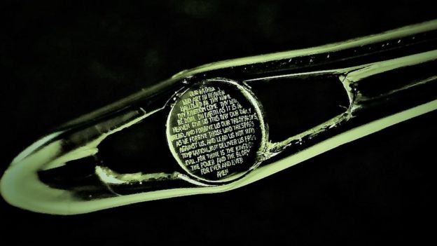 Tiny gold Lord's Prayer engraved in eye of needle by Birmingham artist ...