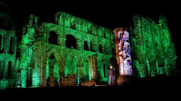 Dracula: Whitby Abbey lit up for spooky celebration - BBC Newsround