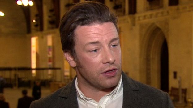 Asda and Aldi stop energy drink sales to under-16s - BBC News