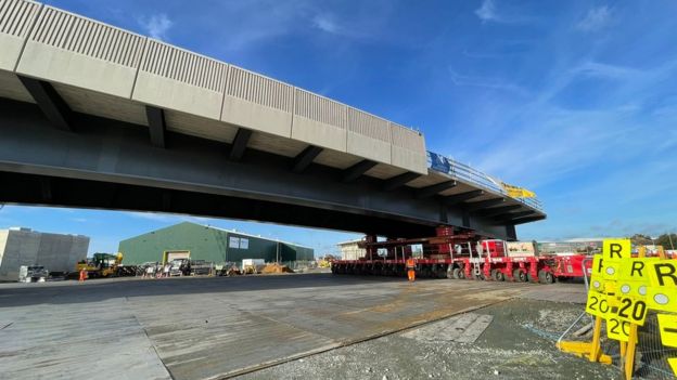 First piece of Lowestoft's Gull Wing Bridge being moved into place ...